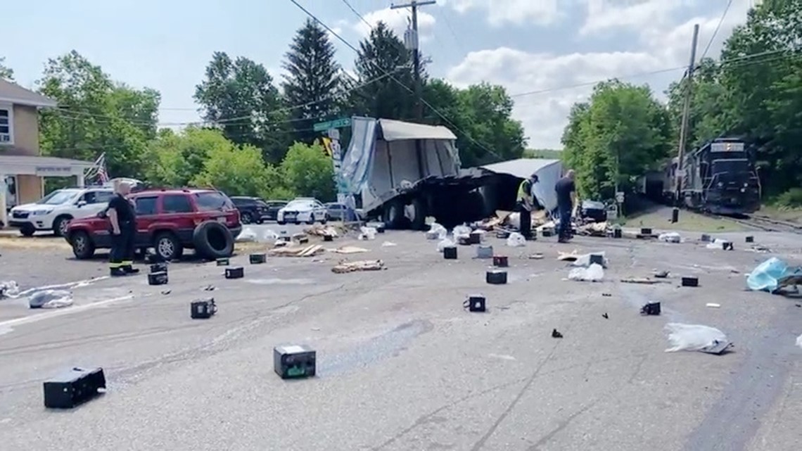 Batteries litter scene of train and truck crash | wnep.com