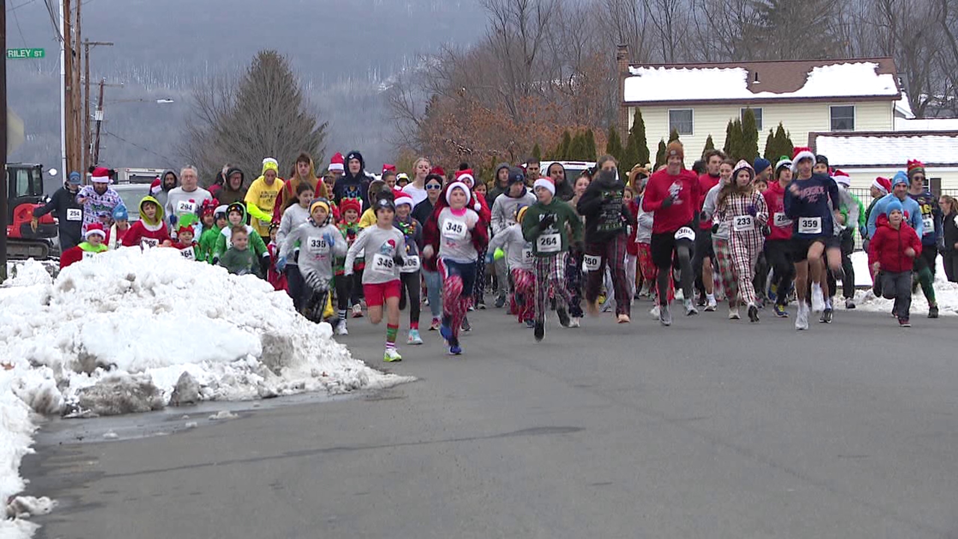 Racers support Old Forge cross country team in festive Jingle Bell Jog ...