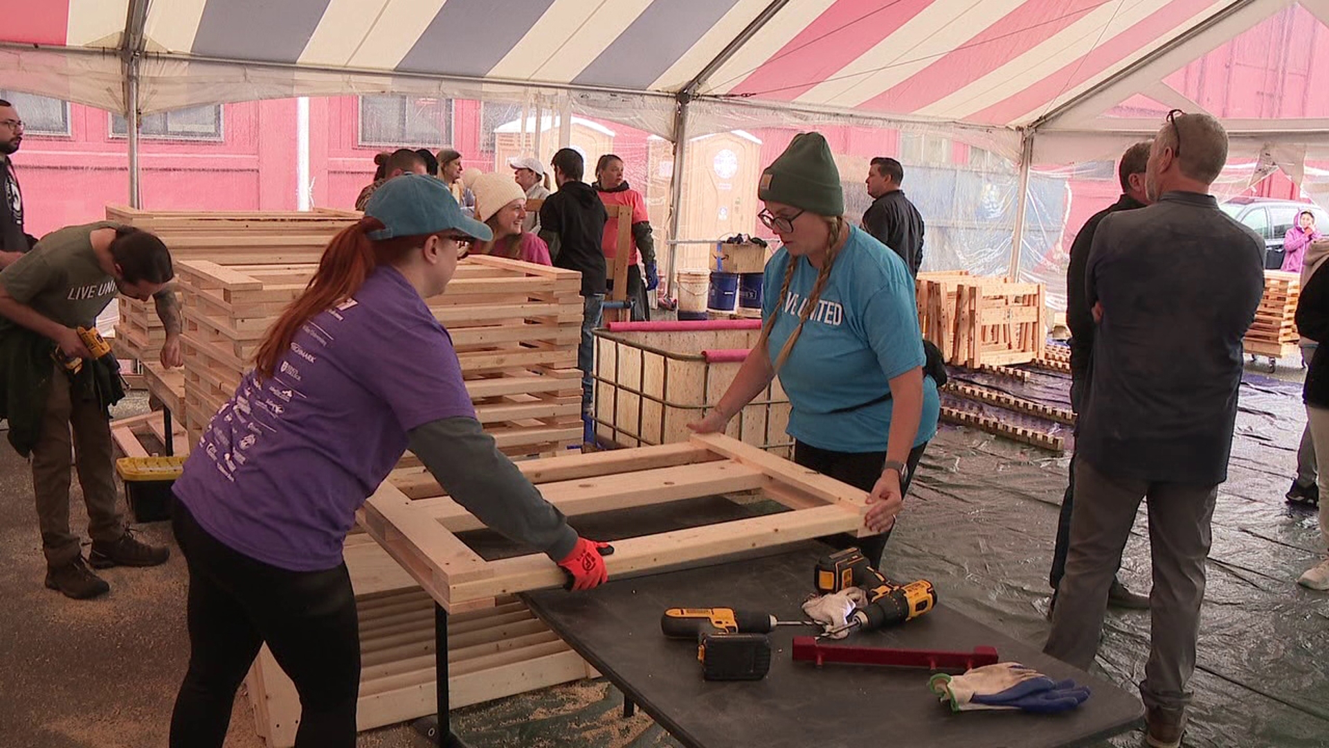 Volunteers in Luzerne County build beds during Day of Caring event ...