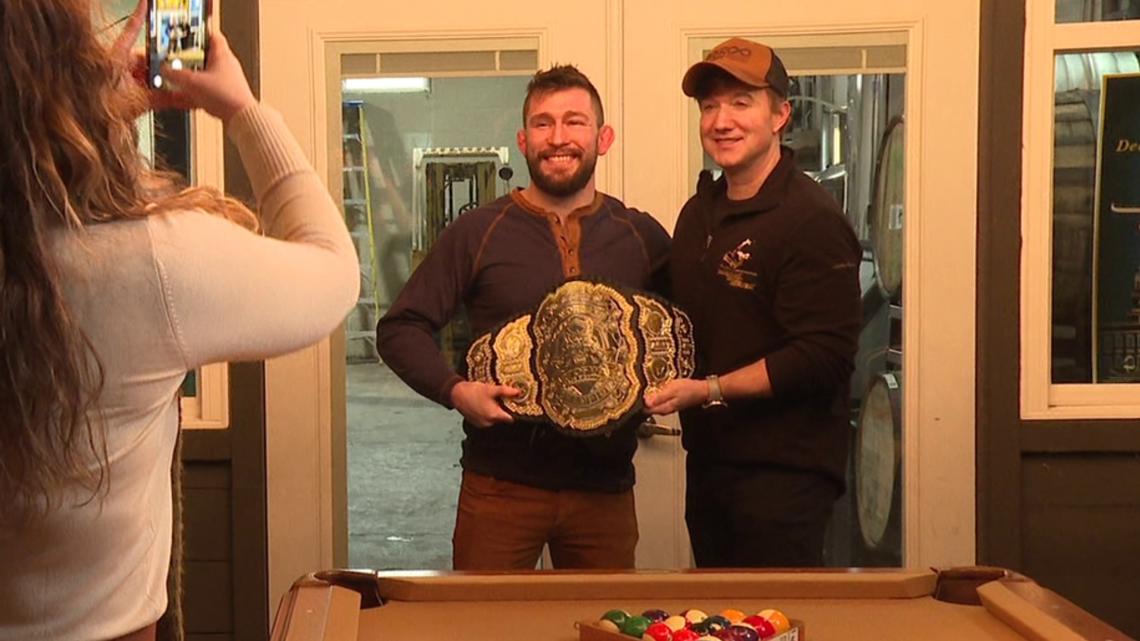 MMA champion Aaron Kennedy celebrates title defense with hometown ...