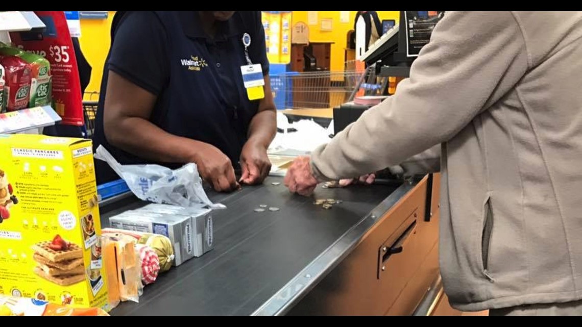 Heartwarming Photo Shows Walmart Cashier Helping Man Struggling to ...