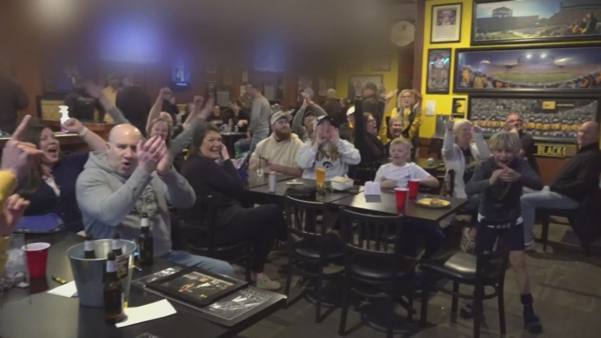 Iowa fans celebrate after Hawkeyes clinch historic Elite Eight berth ...