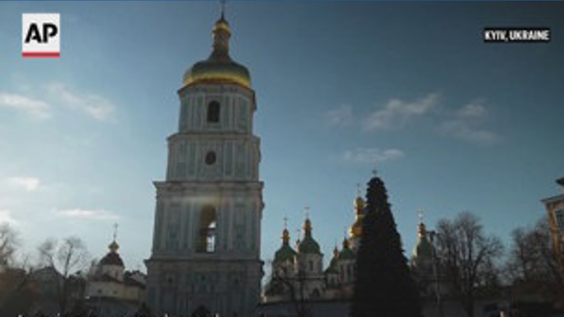 Ukrainians in festive mood for Christmas despite attacks and power ...