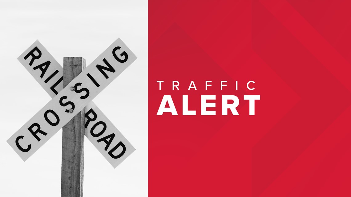 Railroad crossings in Ames reopen after train derailment, city says ...