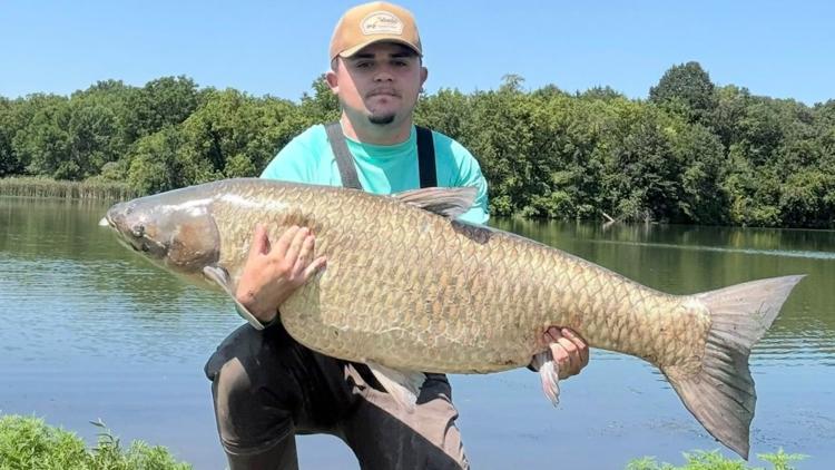 Holy carp! Western Iowa angler catches world record fish | wqad.com