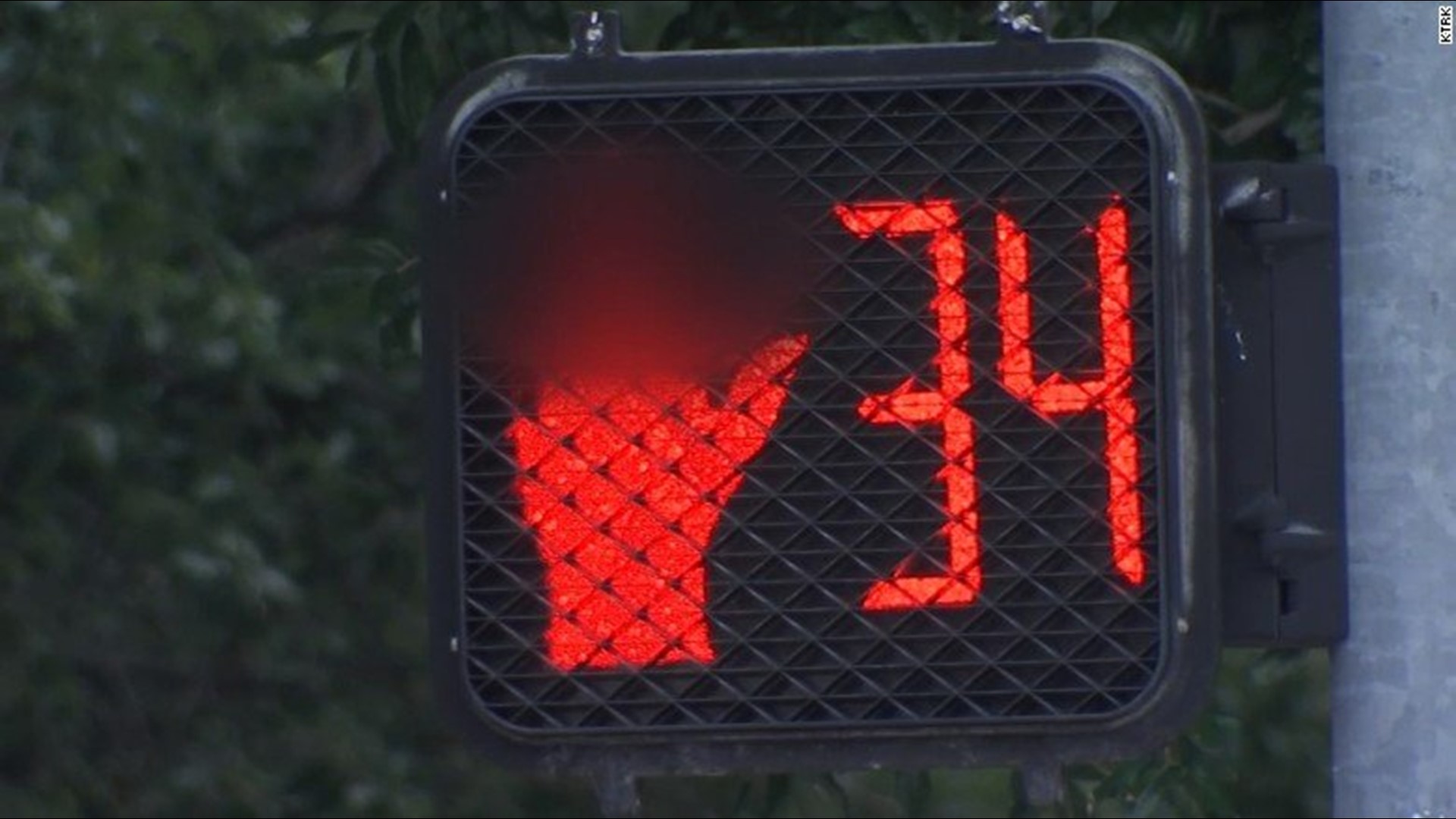 Crosswalk signs flash obscene gesture at pedestrians | fox43.com