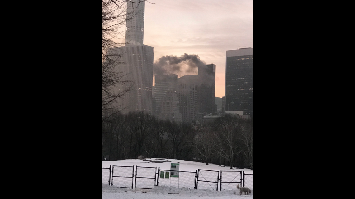 Two injured after firefighters battled flames on top floor of Trump ...