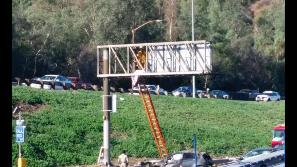 Man lands on freeway sign after being ejected from vehicle in fatal ...