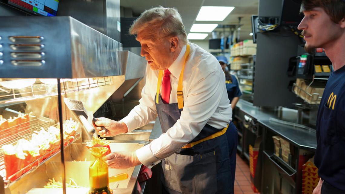 Trump works fry station, holds drive-thru news conference | wqad.com