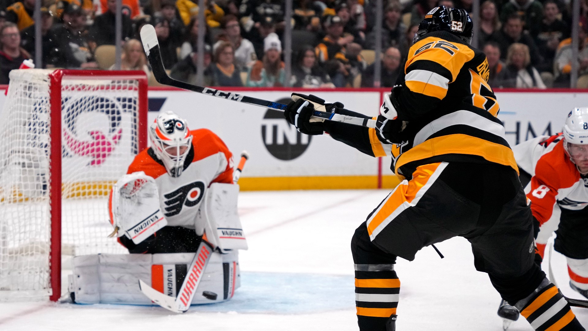 Crosby collects 4 points as Penguins hold off rival Philadelphia in ...