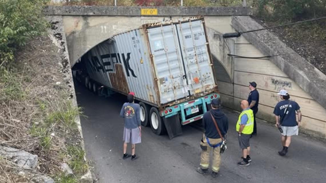 1 injured after tractor trailer gets stuck under bridge | fox43.com