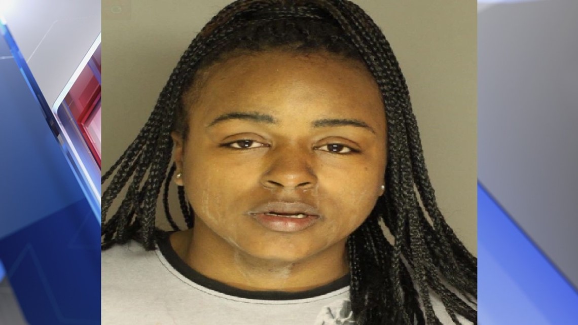 Woman arrested after depositing fraudulent checks, costing bank nearly ...