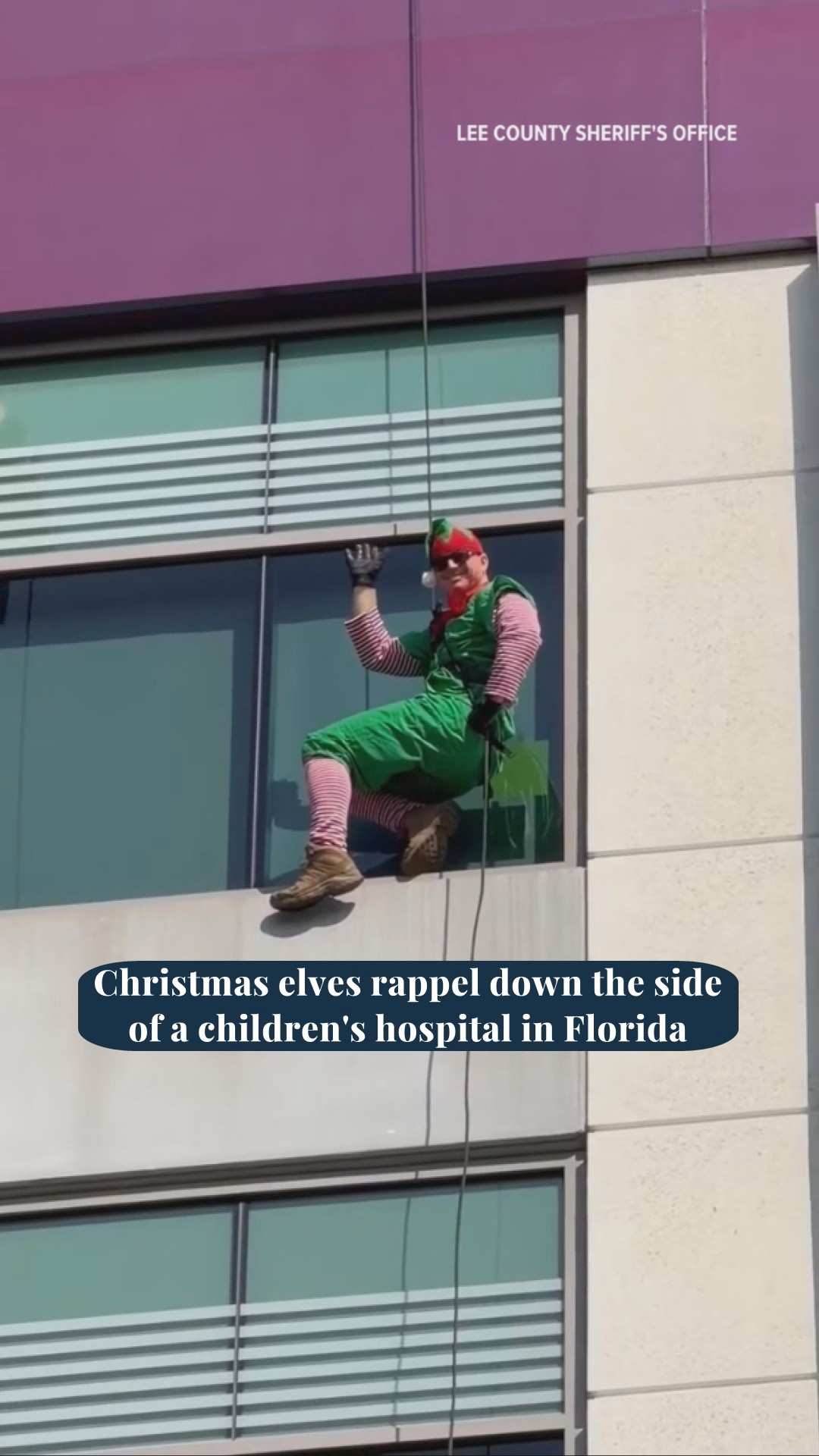 Elves rappel down the side of a children's hospital in Lee County ...