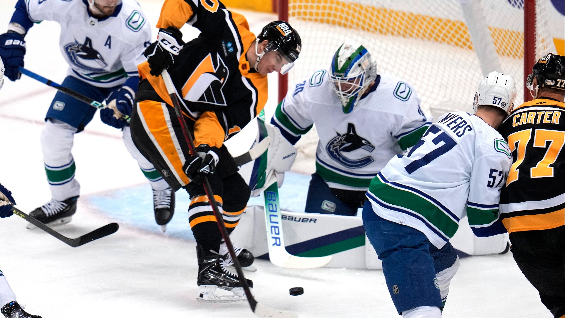 Malkin's 4-point game fuels rally as Pens top Canucks 5-4 | fox43.com