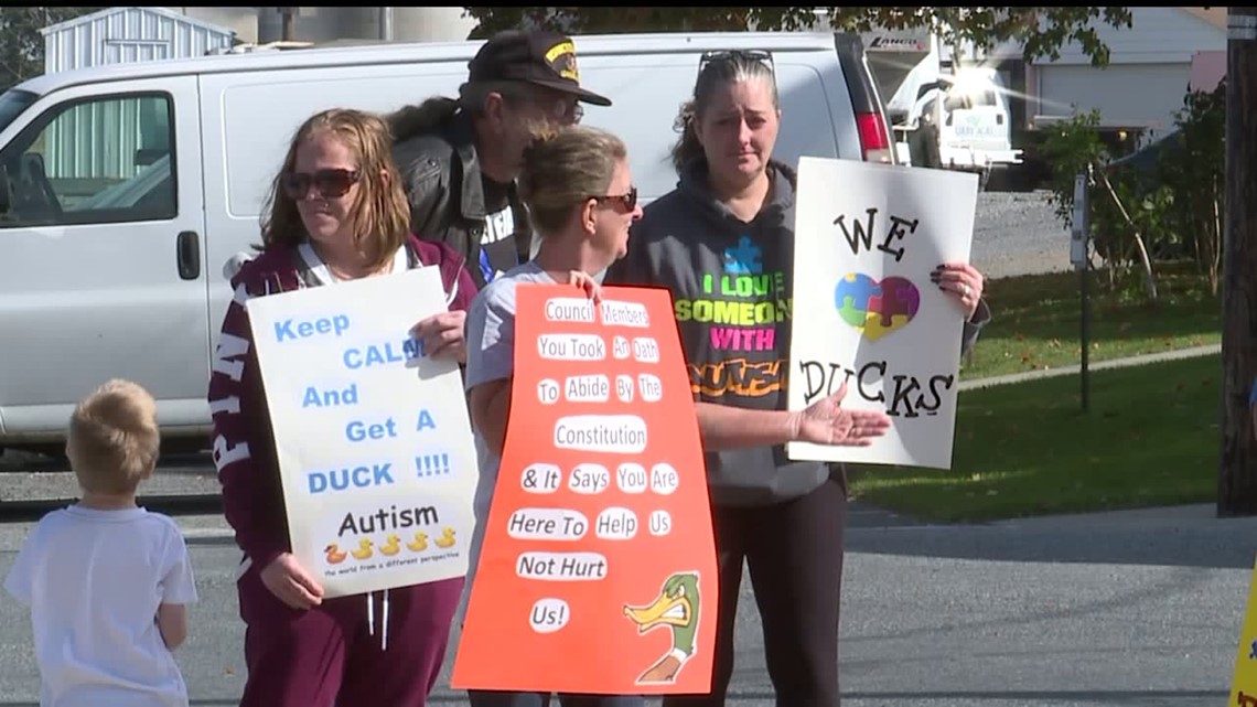 Neighbors, friends, and family protest to keep ducks at home in ...
