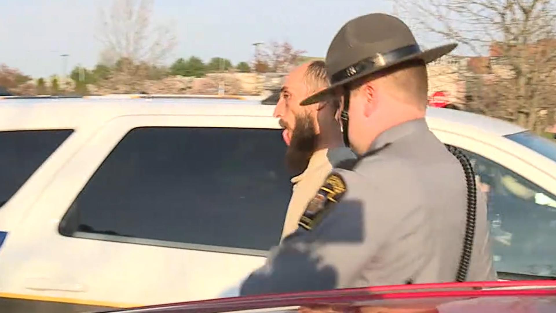 Cody Balmer walking out of court | fox43.com