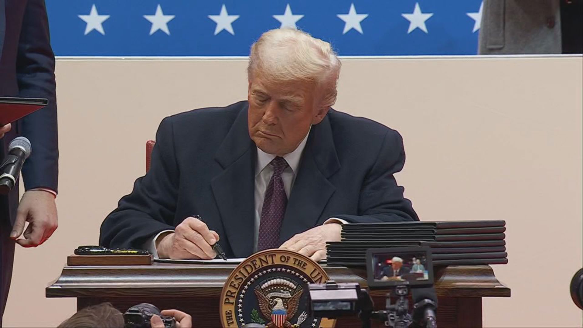 Trump signs record-breaking number of executive orders on inauguration ...