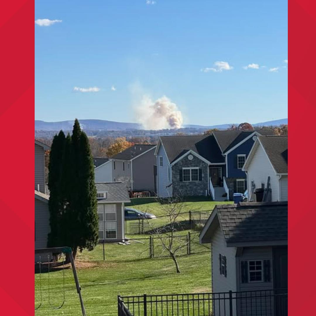 Crews fight large field fire started by burning trash and debris in ...