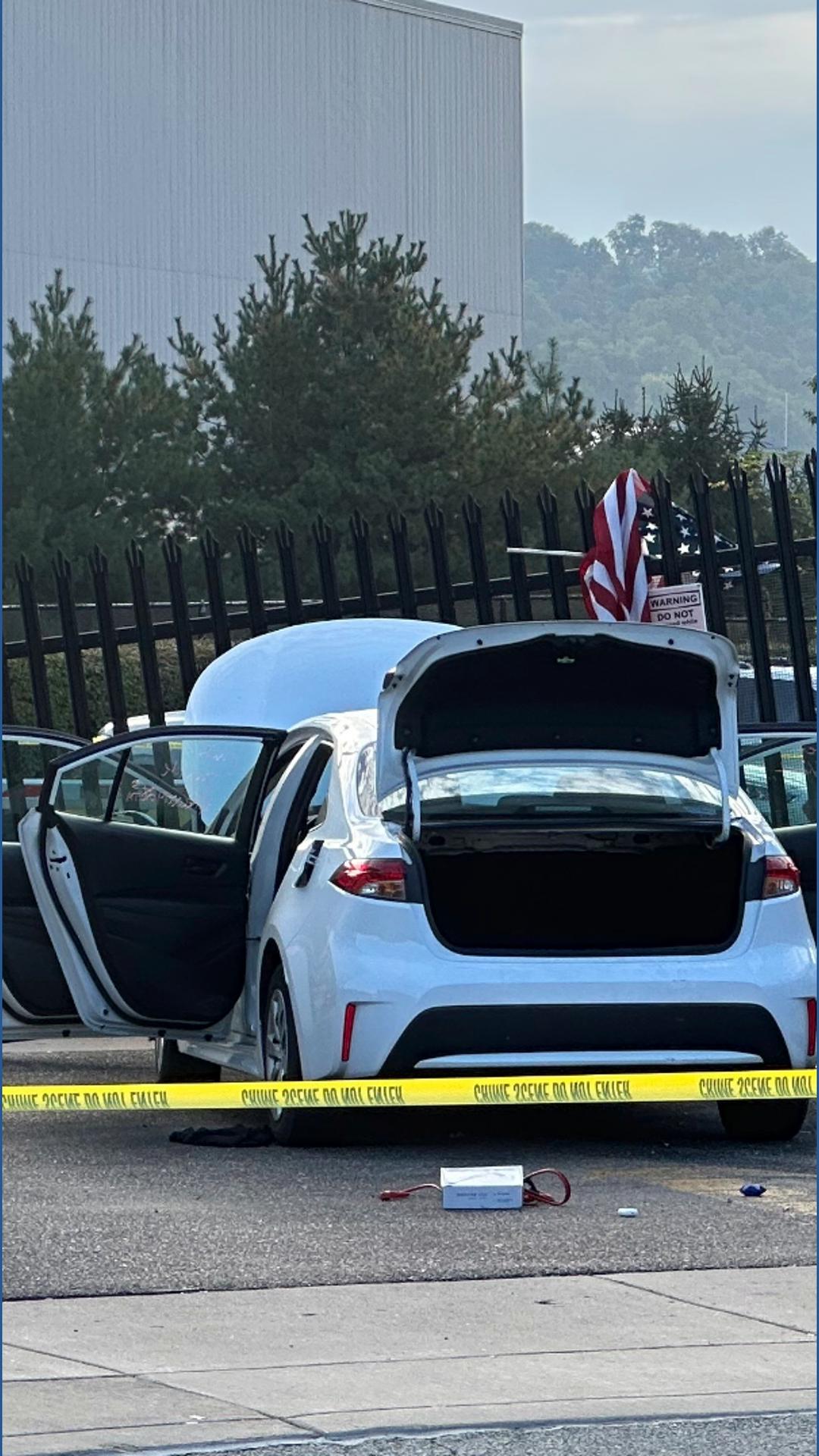 Suspect in custody after driver rams car into staffed security gate at ...