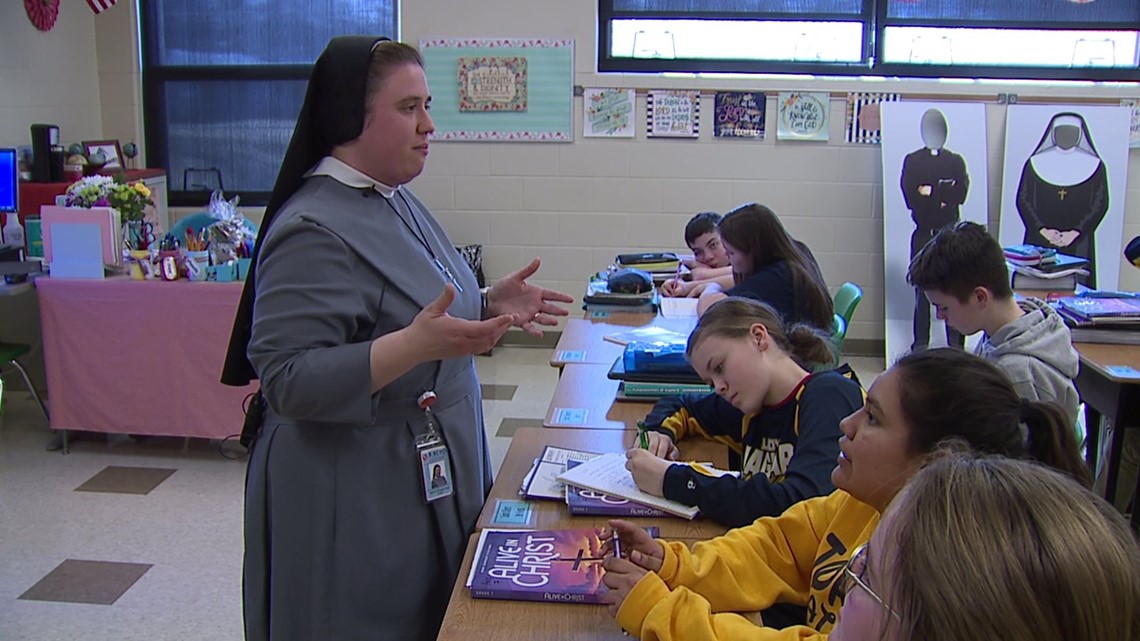 First year teacher making her mark on Jordan Catholic students | wqad.com