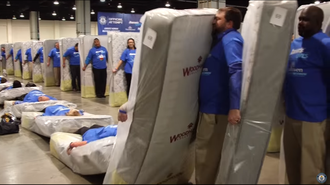 1,200 participants break record for longest human mattress dominoes ...