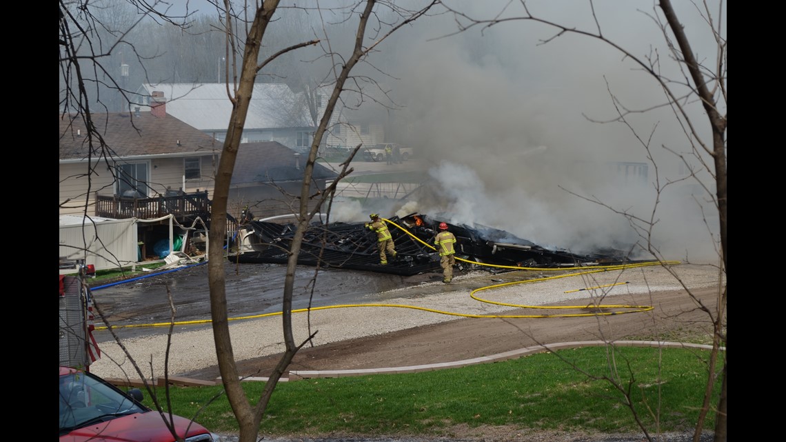 Photos: Fire destroys garage and damages homes in Colona neighborhood ...
