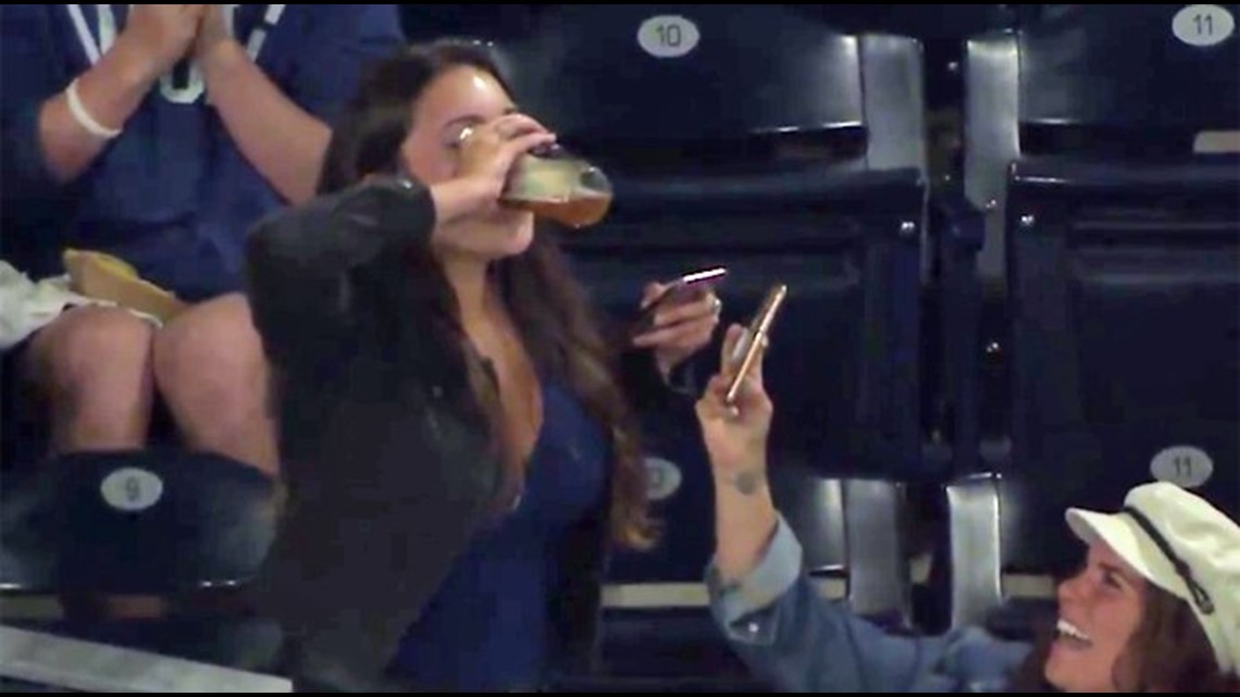Woman catches foul ball in her beer — then chugs it! | wqad.com
