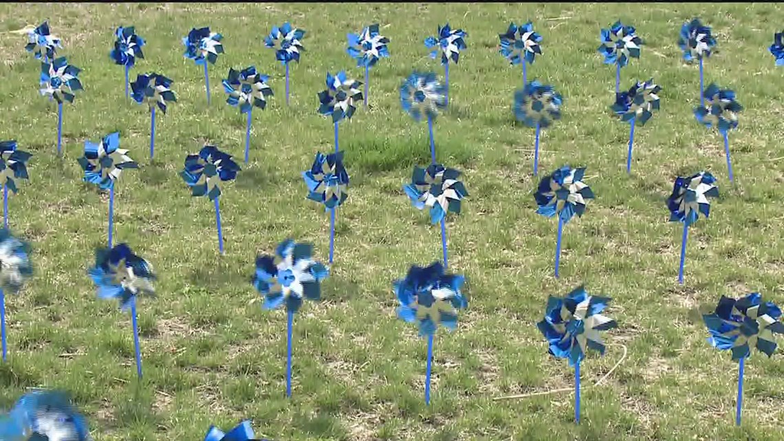 What these blue pinwheels signify around the Quad Cities | wqad.com