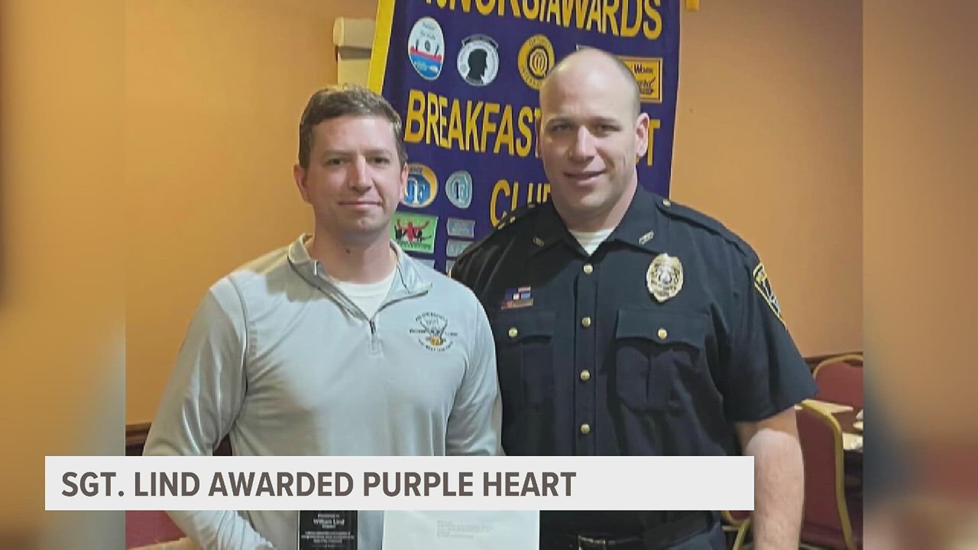 Officer Sergeant Lind receives Purple Heart by East Moline chief | wqad.com
