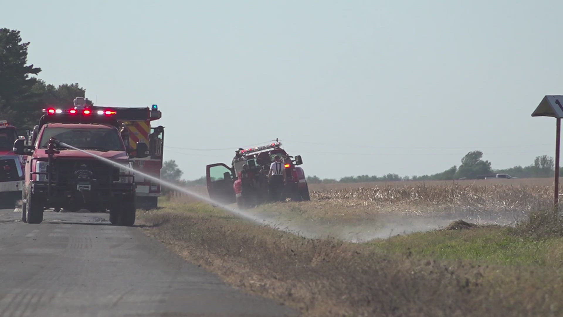 Firefighters from nearly 20 departments battle massive field fire near ...
