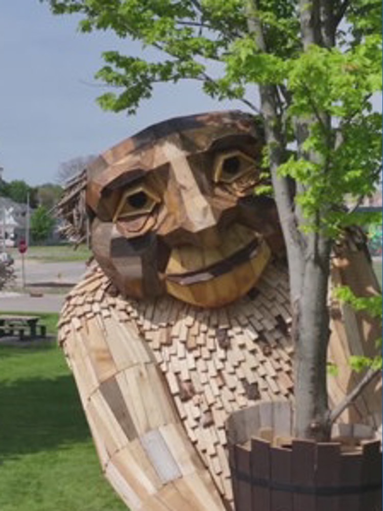 Artist Thomas Dambo reveals hidden fourth giant troll in Clinton | wqad.com