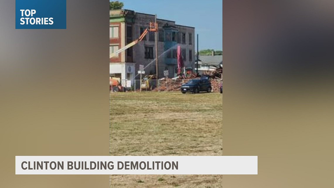 Clinton public works clearing out debris from collapsed building | wqad.com