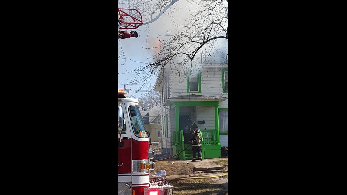 Flames cover roof of Rock Island duplex | wqad.com