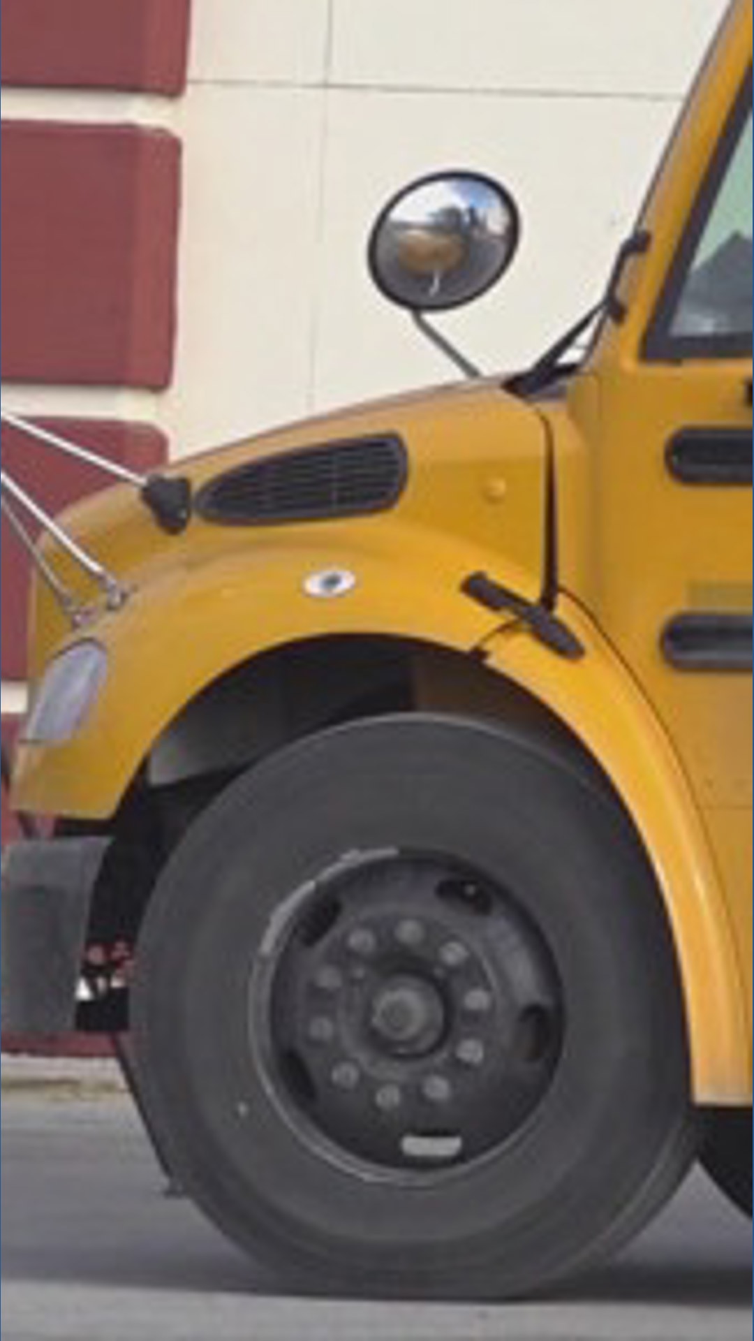 Child seriously injured after falling under school bus in Davenport ...