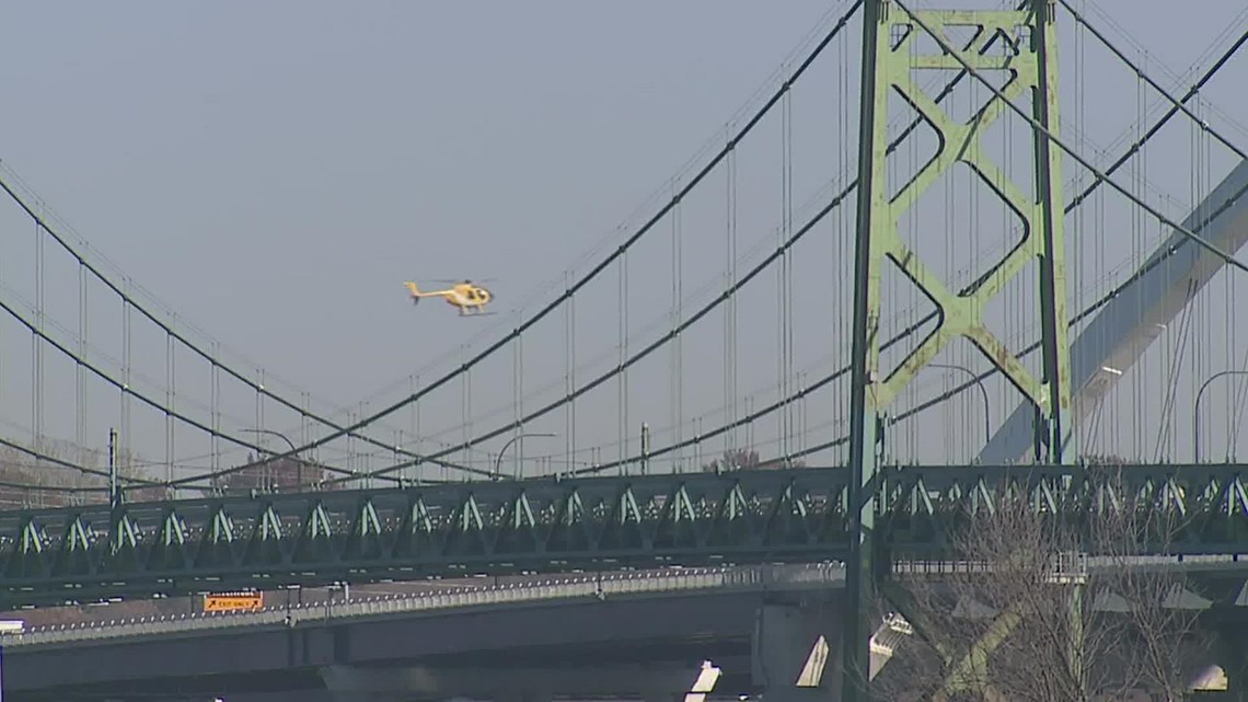 See a yellow helicopter flying low near the I-74 bridge? It's doing ...