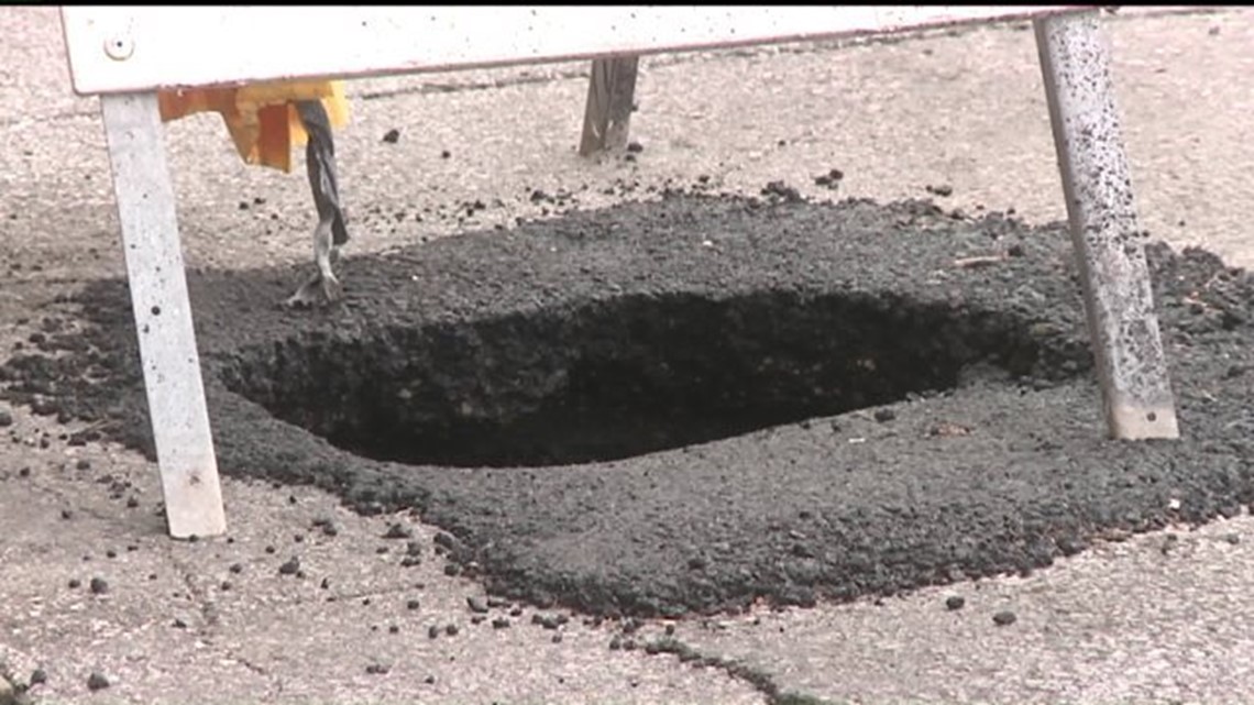 Street collapse on Brady causes northbound lane closure in Davenport ...