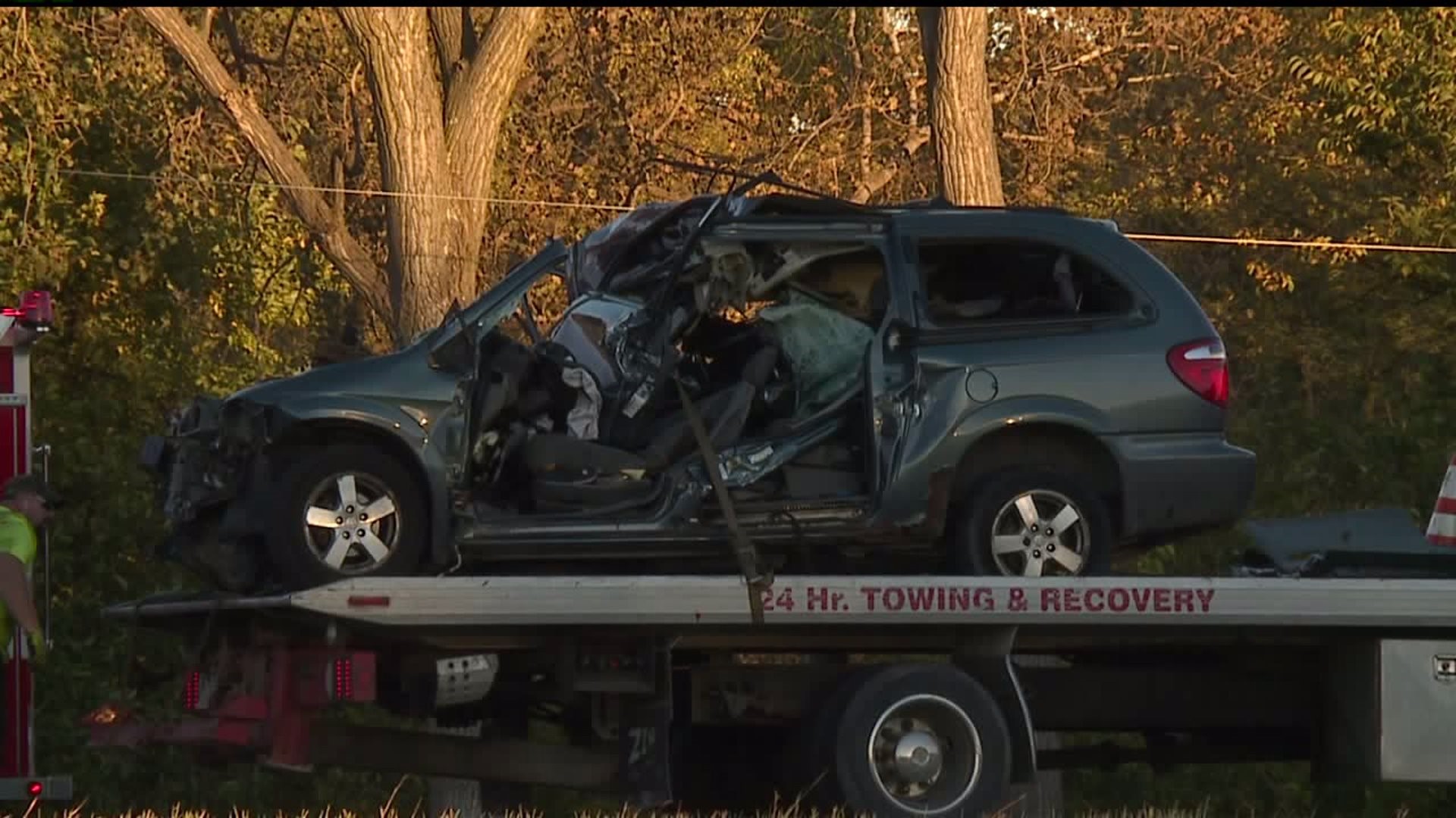 Jaws of life used to free driver and child from minivan that crashed on ...