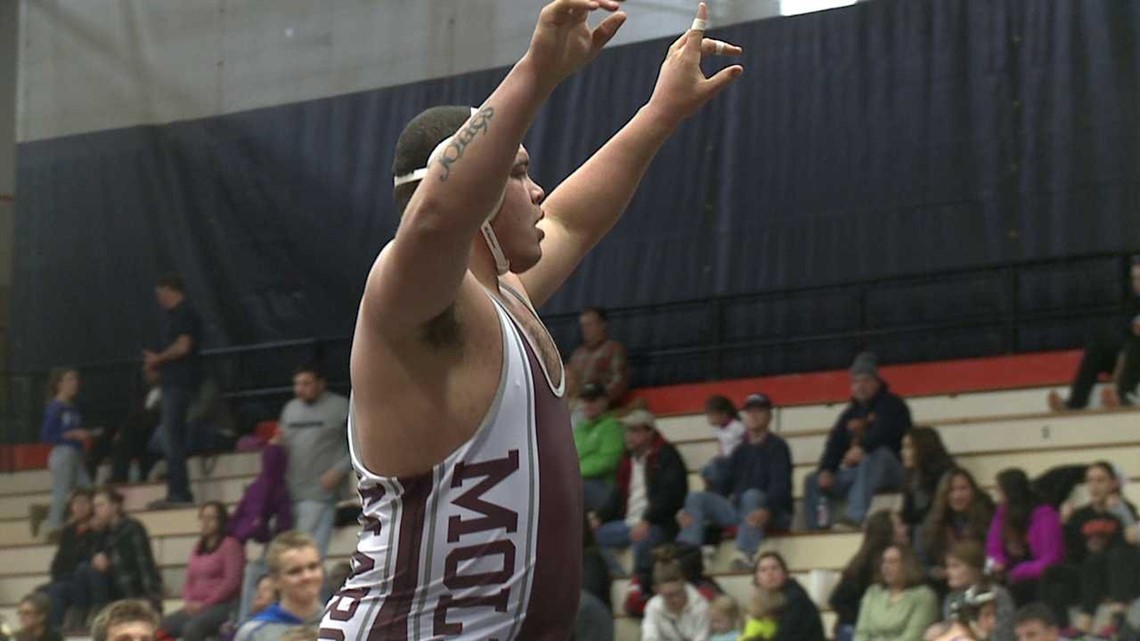 Moline wrestler competes against all odds | wqad.com