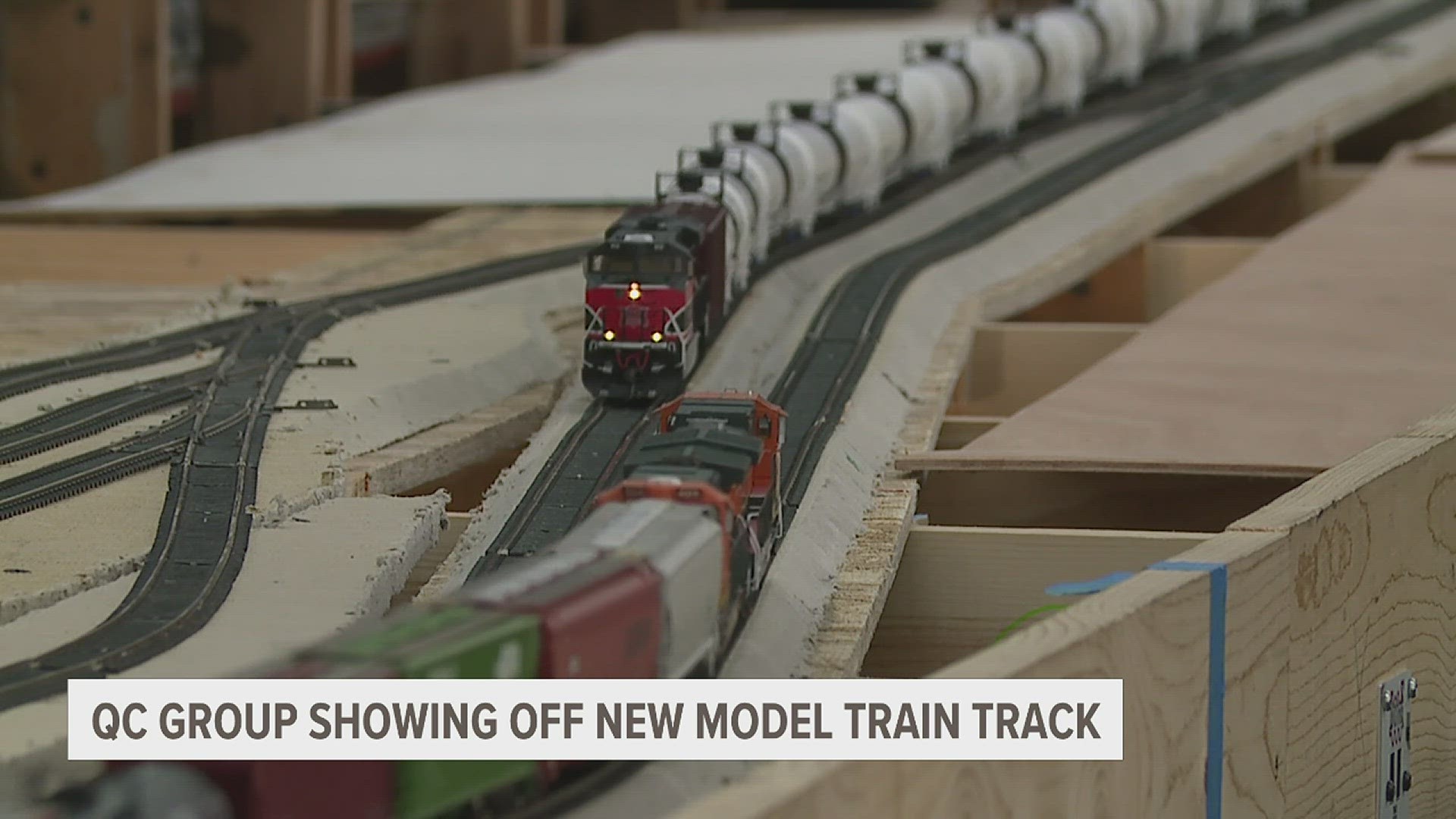 Community members check out model train set up at old library in East ...