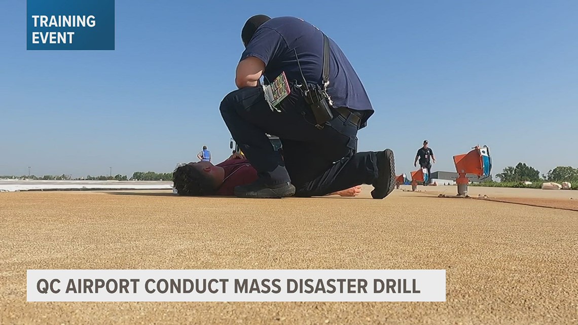 First responders working together during airport disaster drill | wqad.com