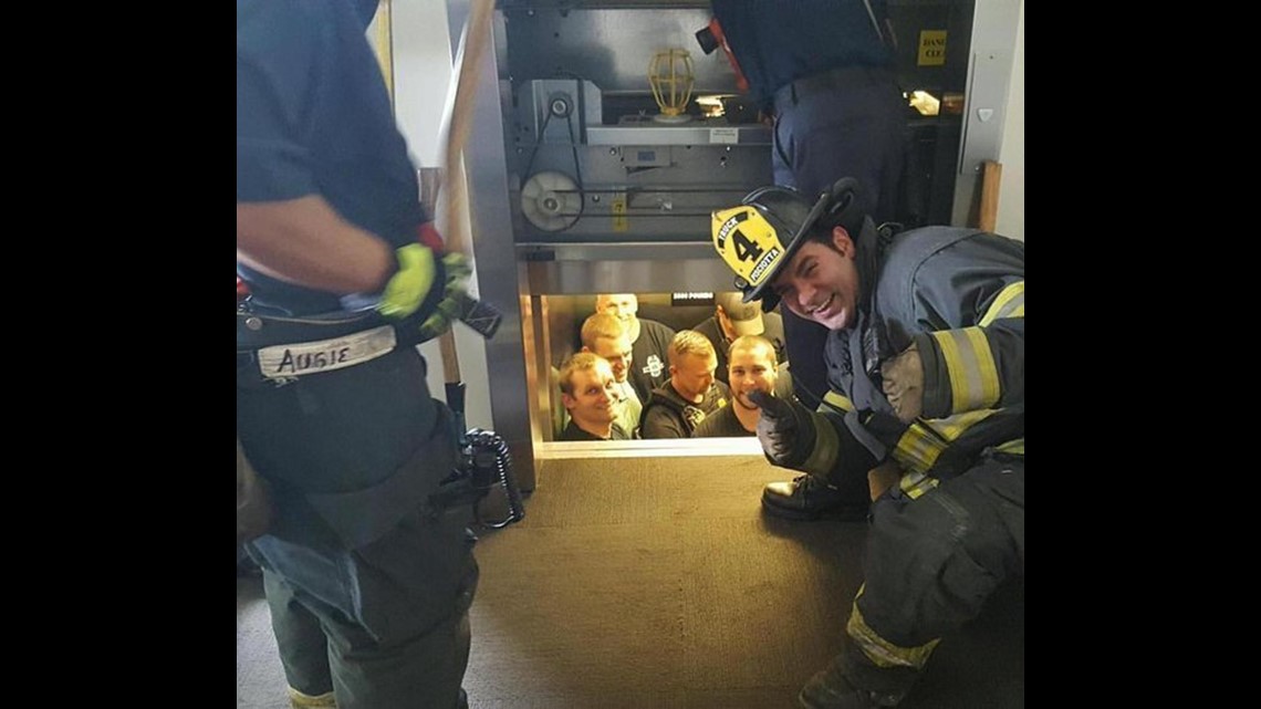 Fire Department rescues police officers stuck in elevator, share photo ...