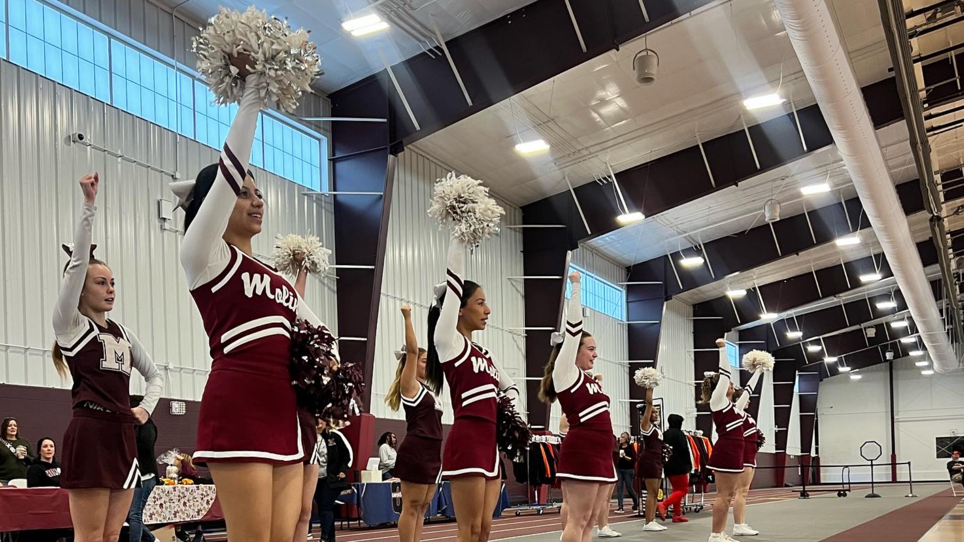 Moline High cheerleaders invited to college prep camp in Hawaii | wqad.com