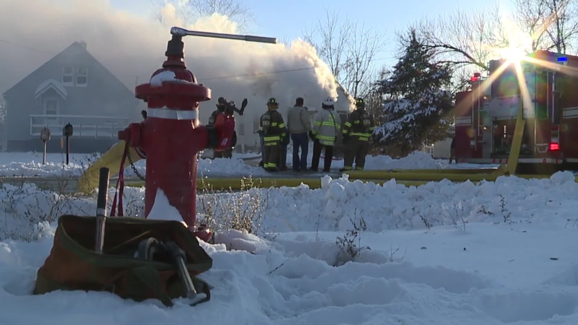 East Moline fire department battles tenacious house fire | wqad.com