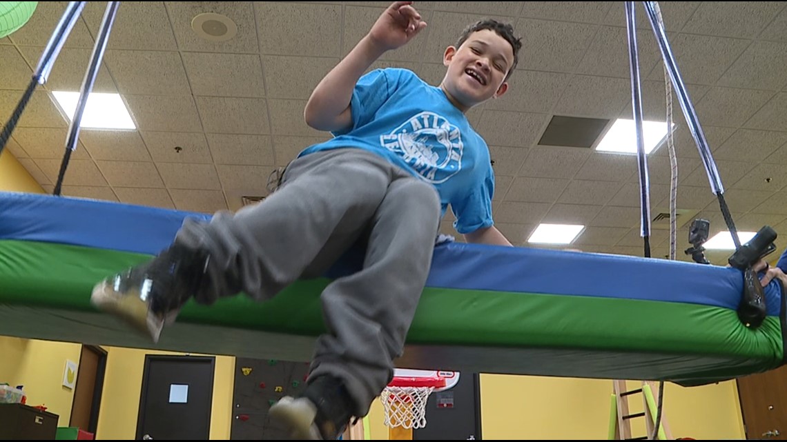 Chuck Long Charity Auction opens for Children's Therapy Center | wqad.com