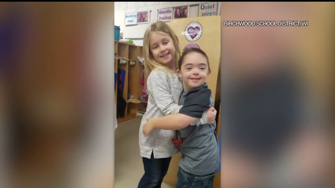 `Classroom Greeter` starts the school day hugging, fist-bumping ...