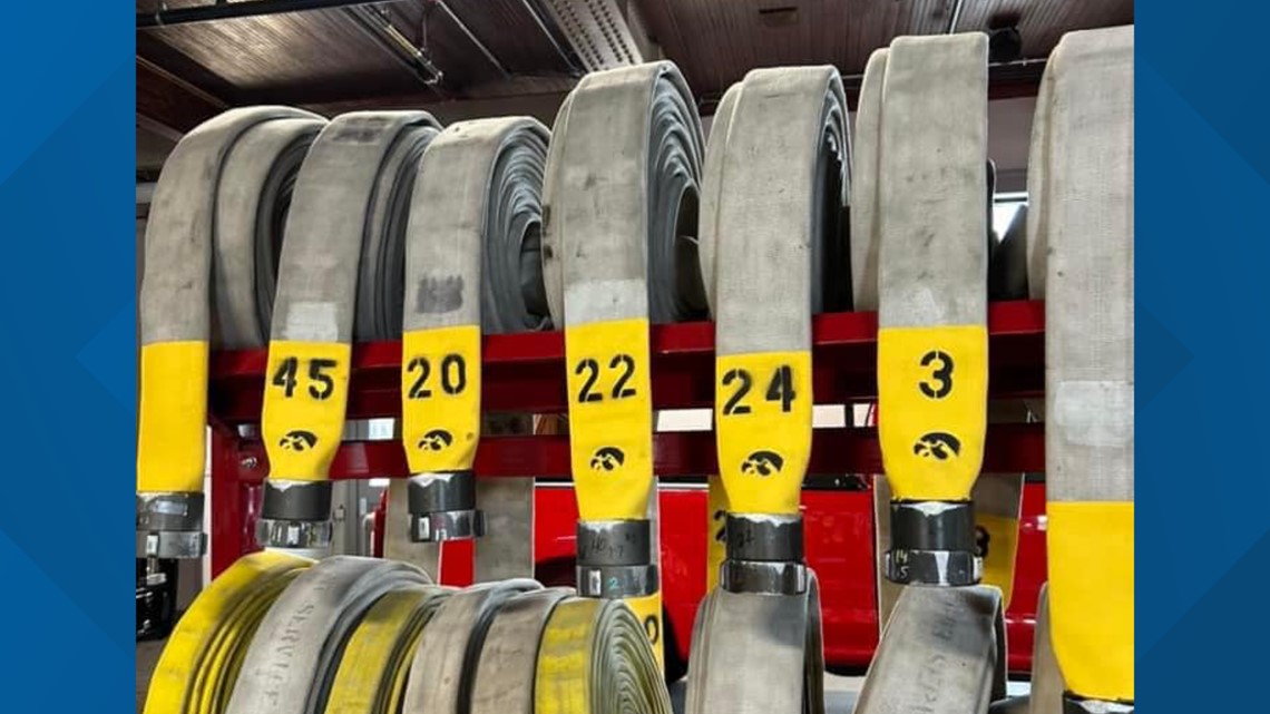 Davenport FD paints fire hoses with Hawkeye-themed colors | wqad.com