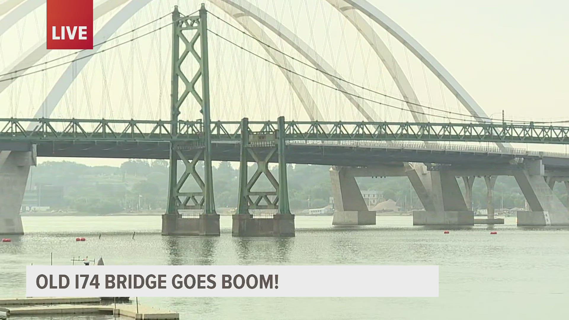 Eastbound side of Old I-74 Bridge explodes into Mississippi River | wqad.com