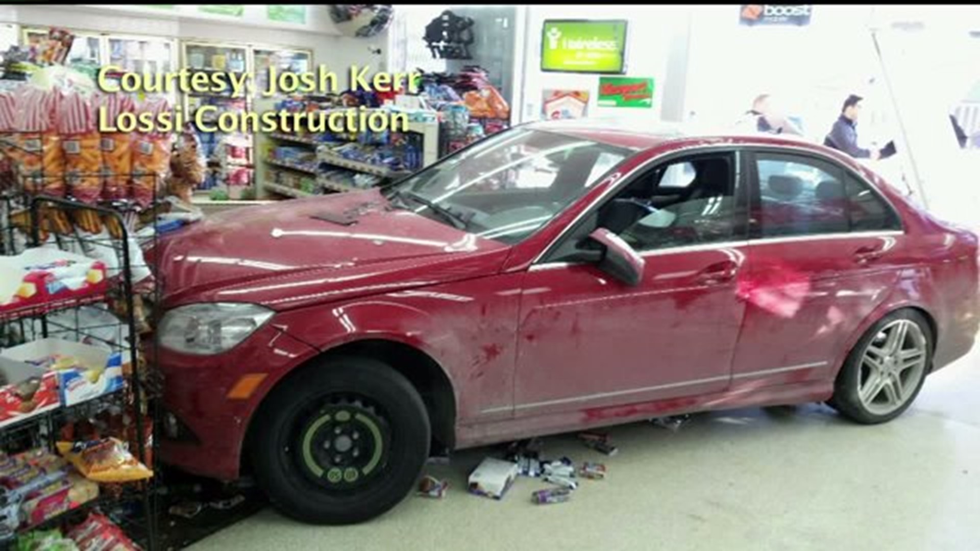 Photos: Car crashes through store in Davenport | wqad.com