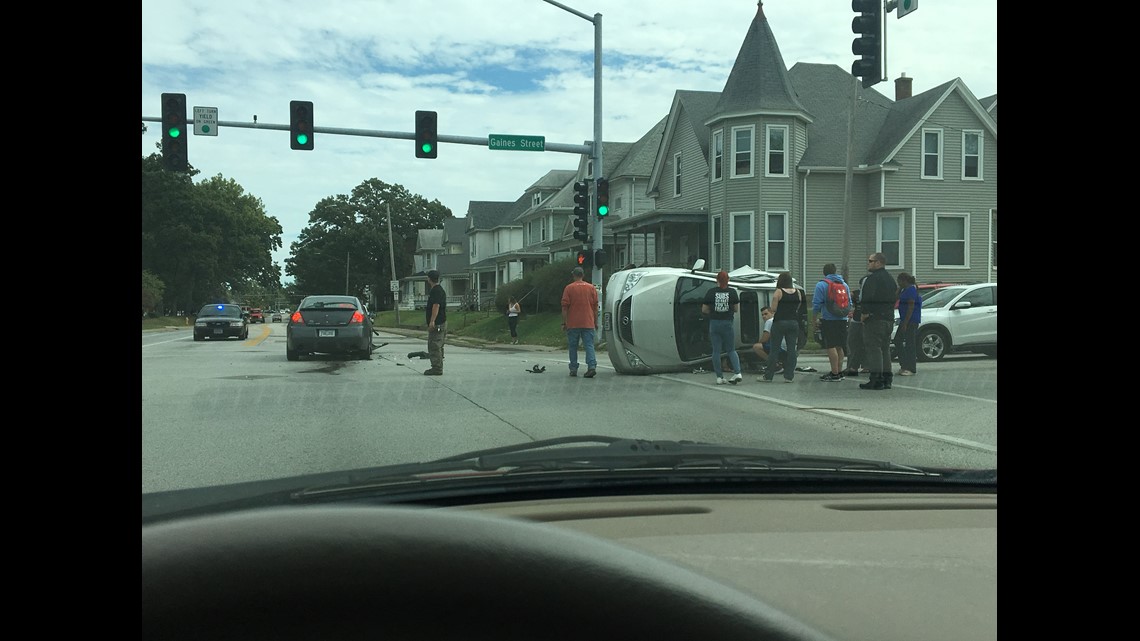 Car crash at Locust and Gaines results in flipped over SUV | wqad.com