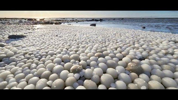 Thousands of 'ice eggs' cover Finland beach in rare weather event ...